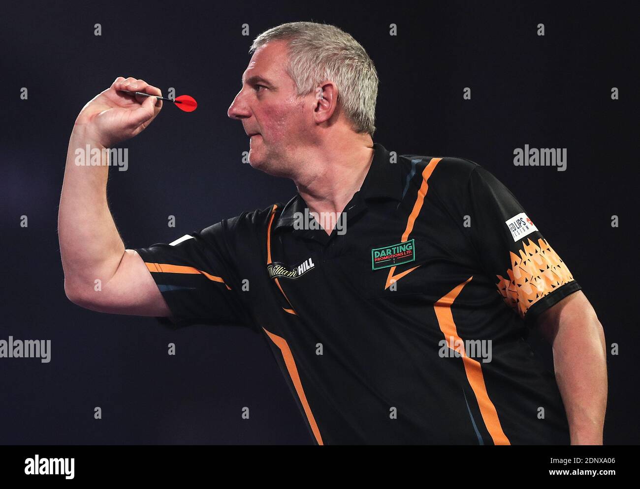Wayne Jones in action during day four of the William Hill World Darts ...