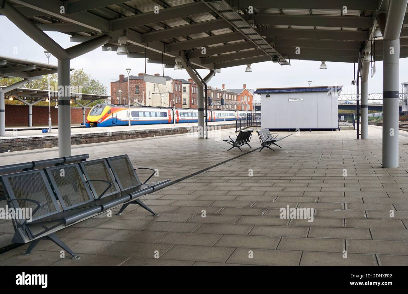 Deserted train station platform example Stock Photo - Alamy