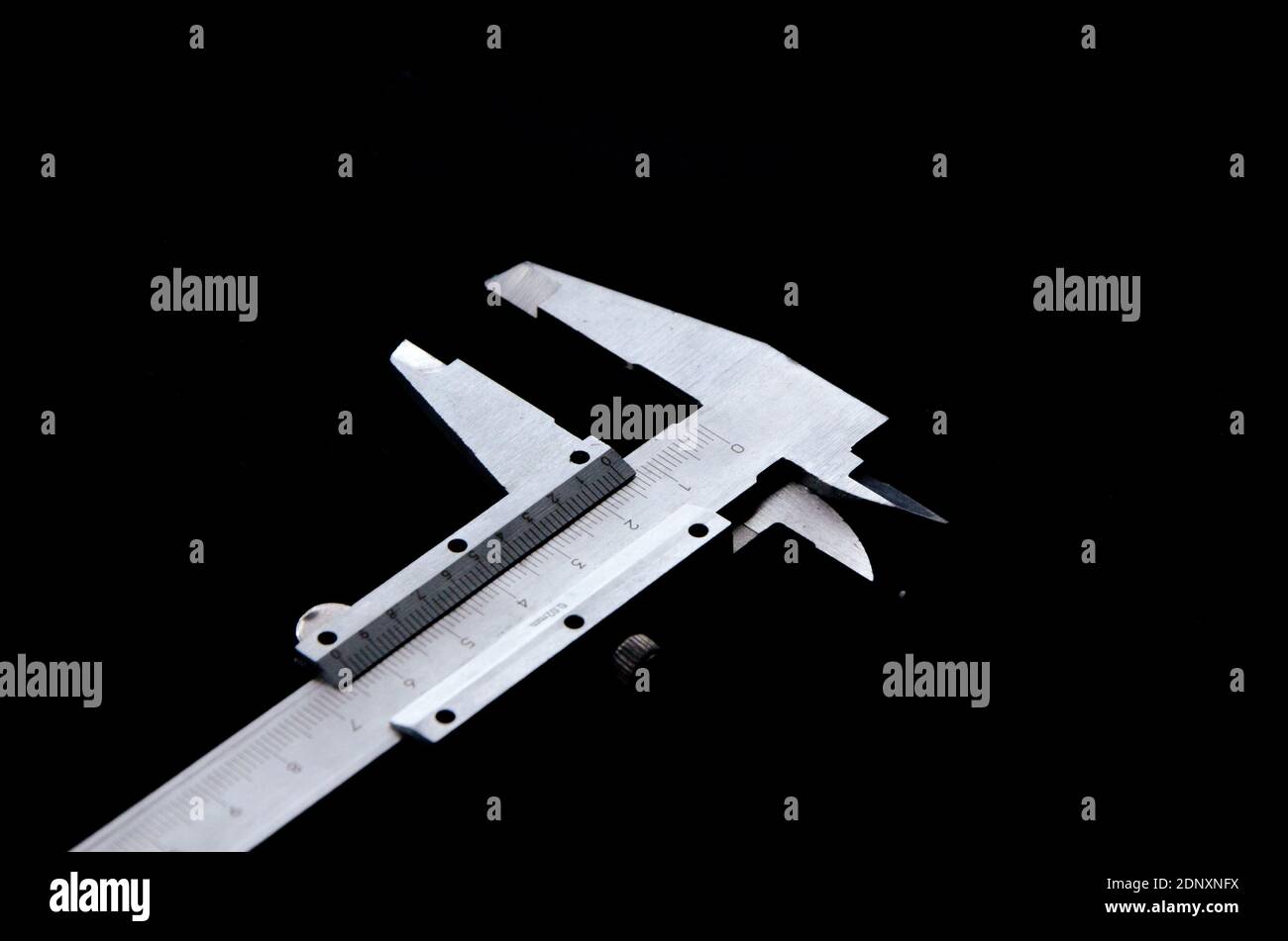 Calipers Isolated on Black Background Stock Photo - Alamy