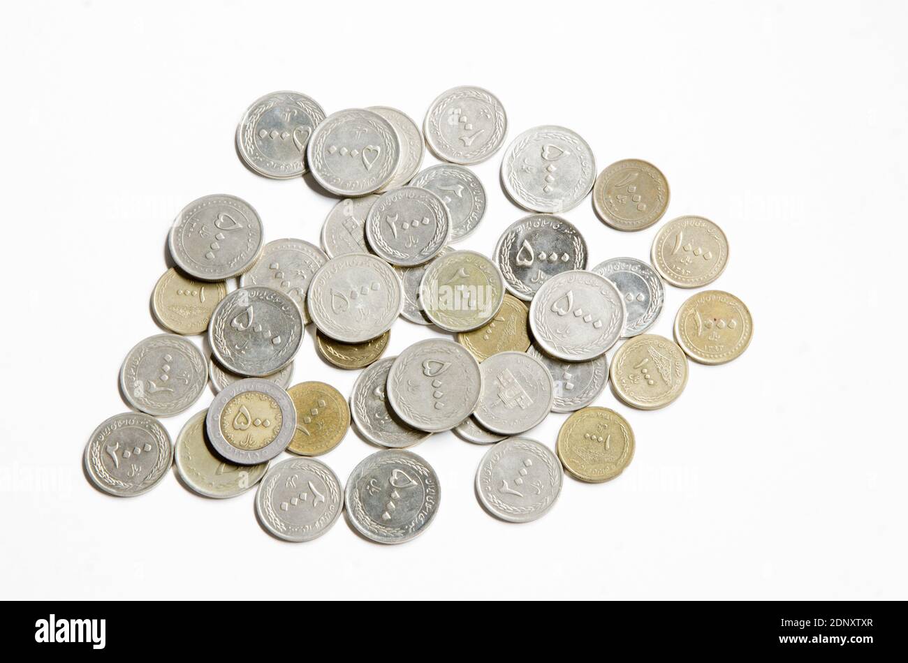 Iranian Rial Coins Piled on White Background Stock Photo - Alamy