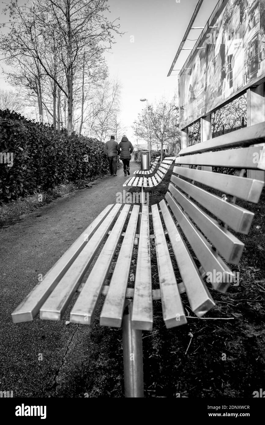 Stainless steel lated bench seating Stock Photo - Alamy