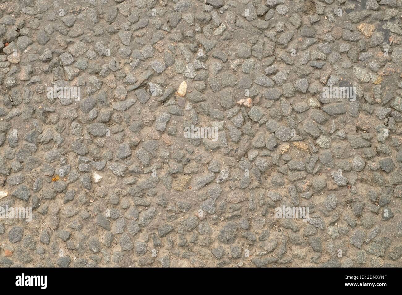 Close up of road surface - tarmac plus embedded gravel Stock Photo - Alamy
