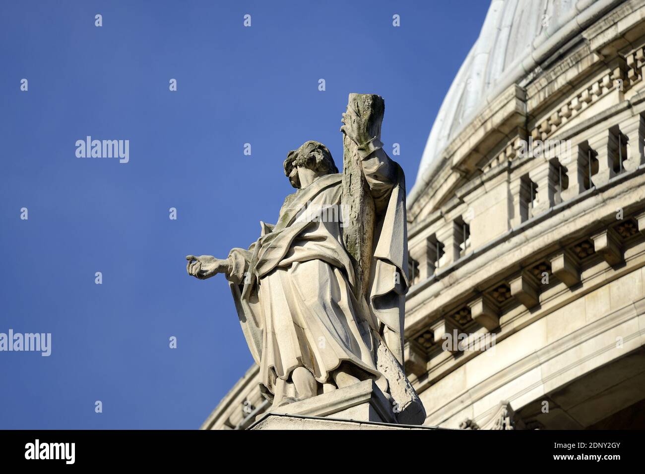 London, England, UK. St Paul's Cathedral. Statue of St. Andrew, with a ...