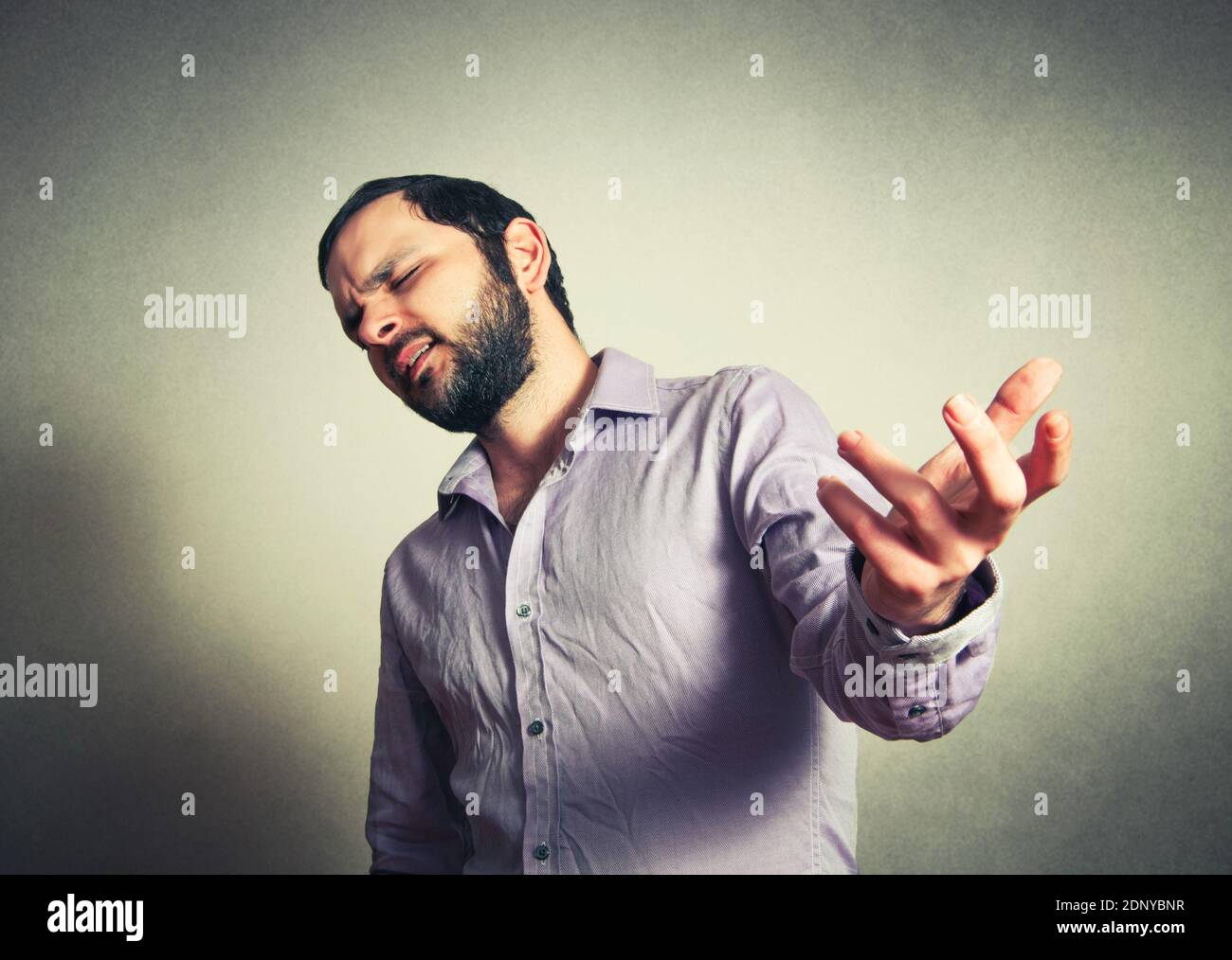 Standing communication facial expression gesturing serious hi-res stock ...