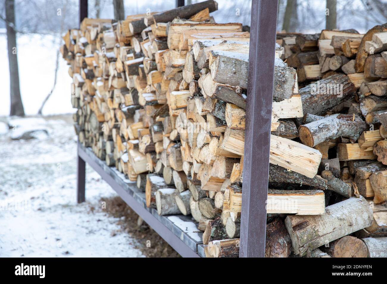 pole with firewood in nature Stock Photo - Alamy