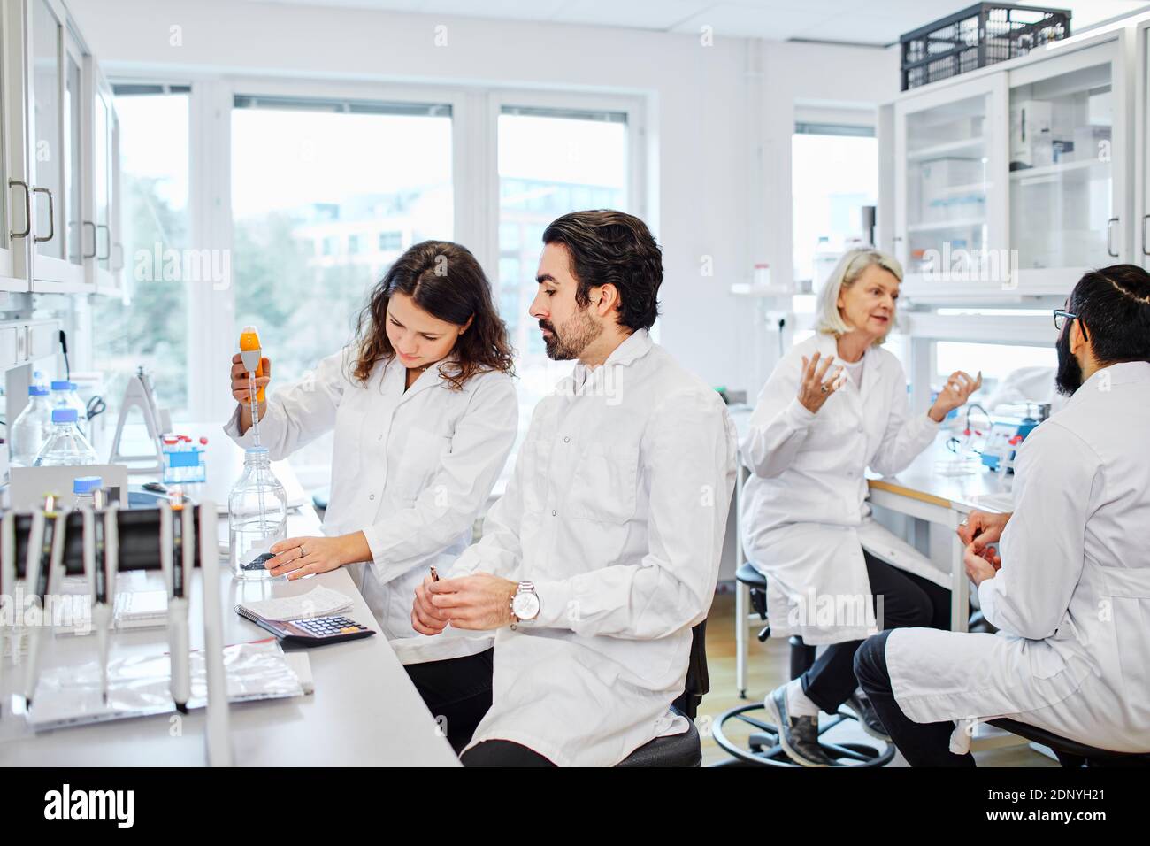 People working in laboratory Stock Photo - Alamy