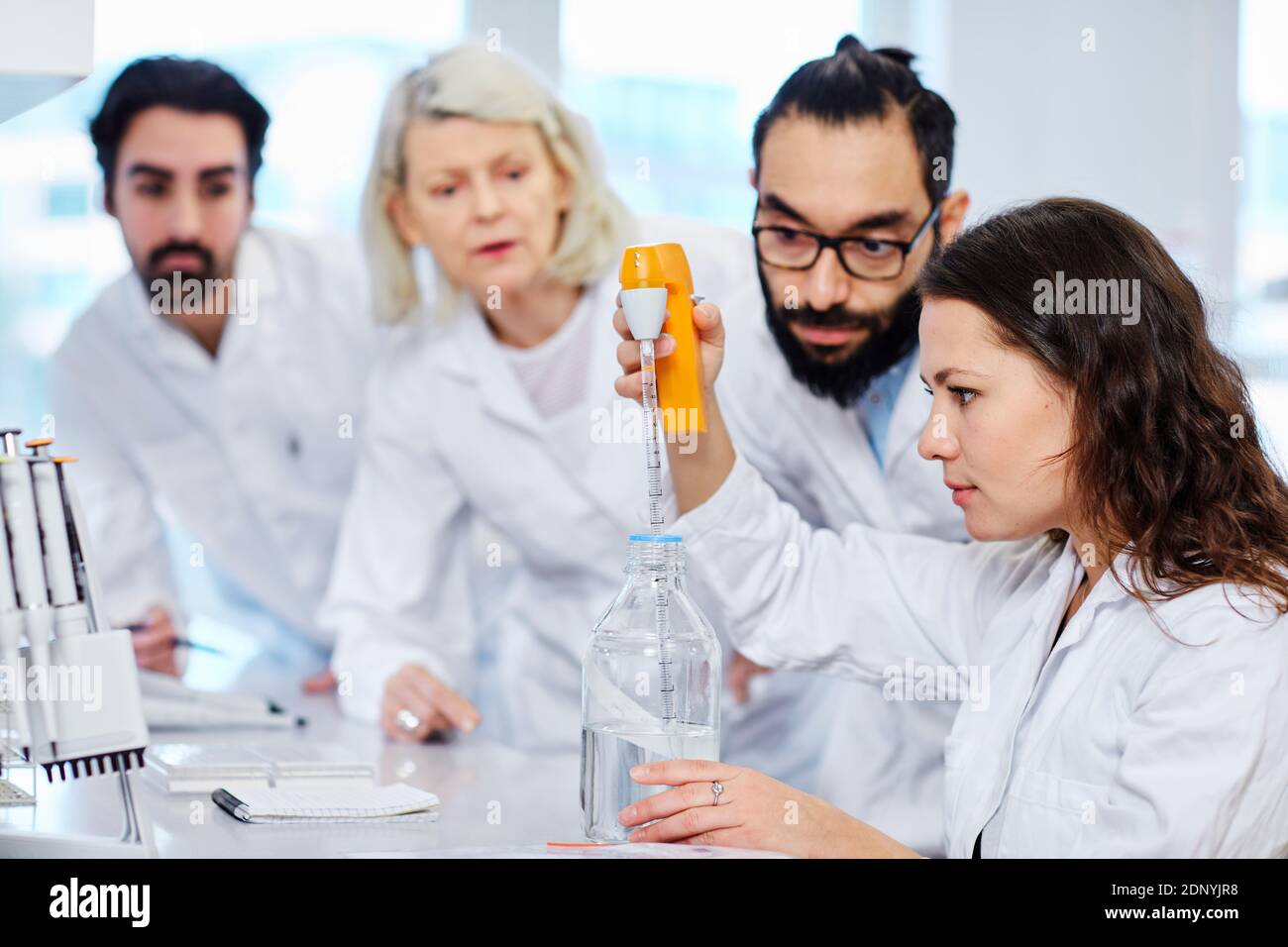 People working in laboratory Stock Photo - Alamy