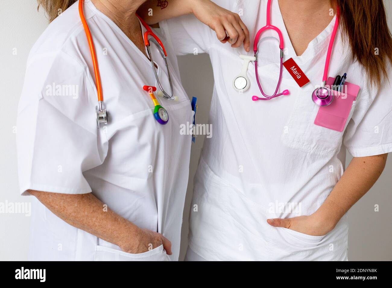 Mid section of female doctors Stock Photo - Alamy