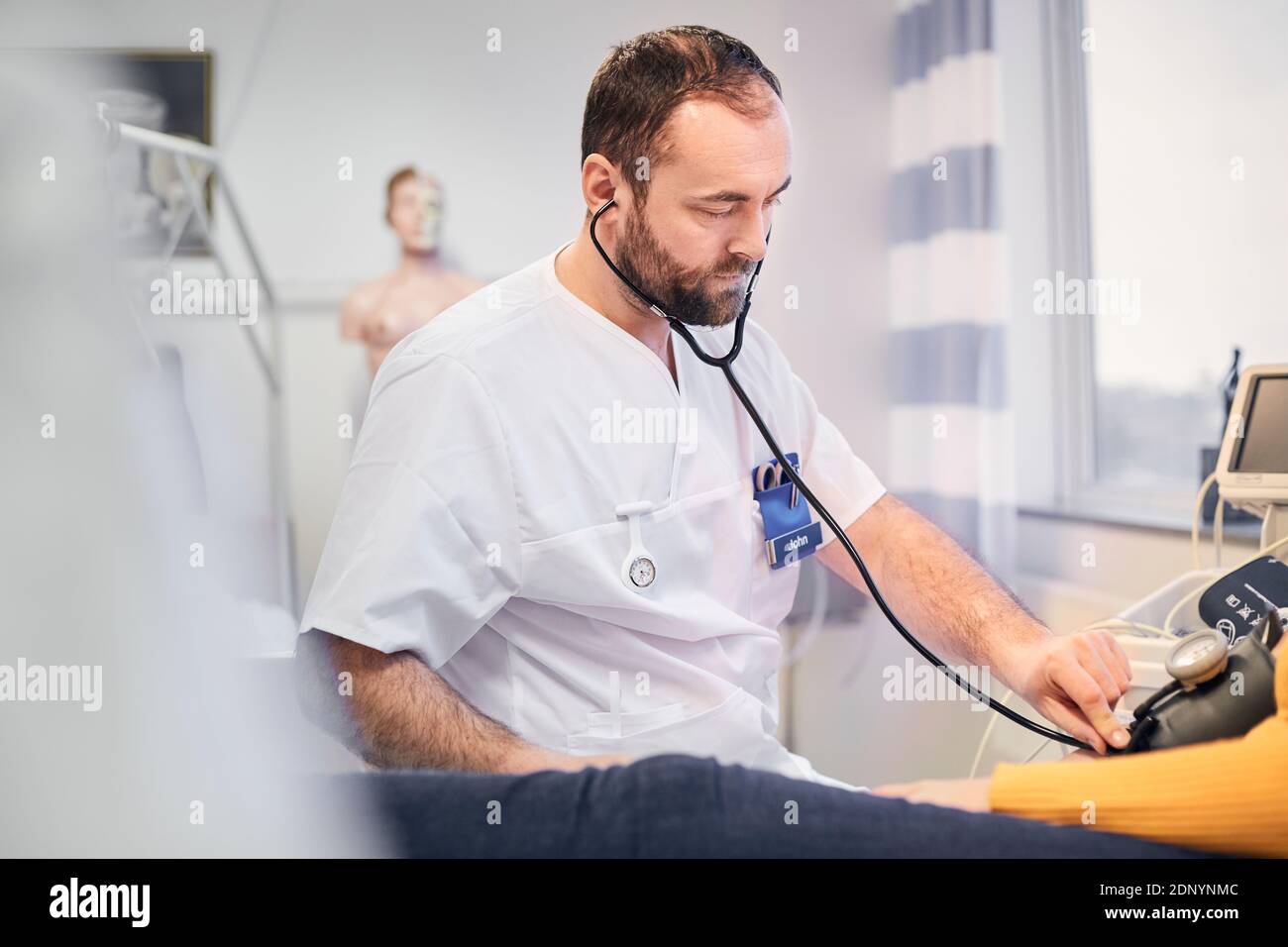 Doctor nurse standing patient hi-res stock photography and images - Alamy