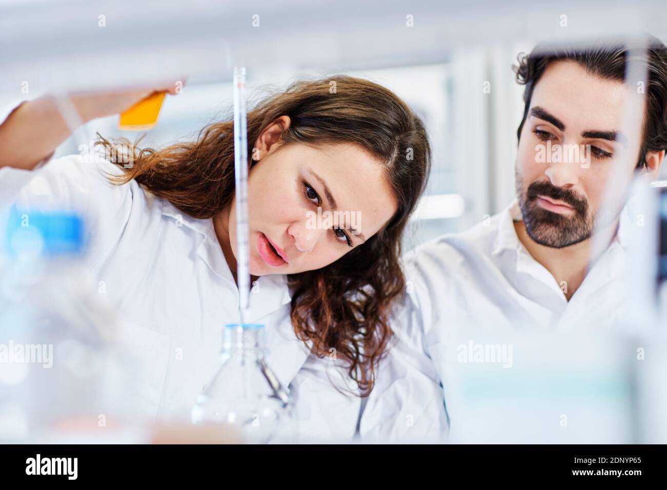 Two scientists working in laboratory hi-res stock photography and ...