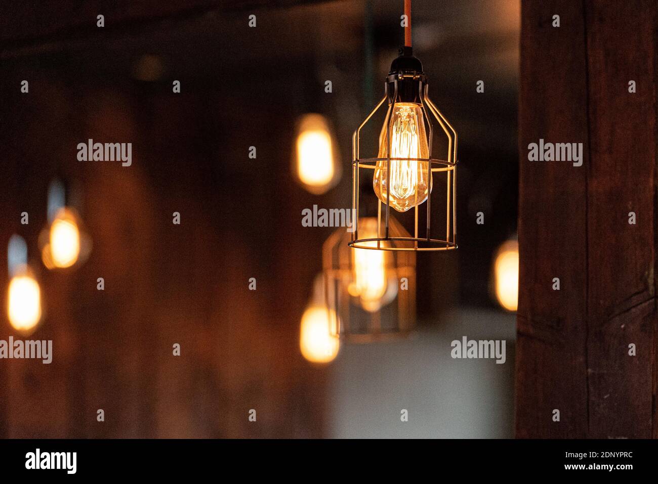 Illuminated row light bulbs ceiling ceiling hi-res stock photography ...