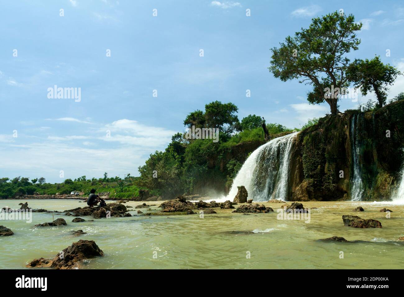 Toroan Waterfall in Sampang, Madura, flows directly into the Java Sea ...