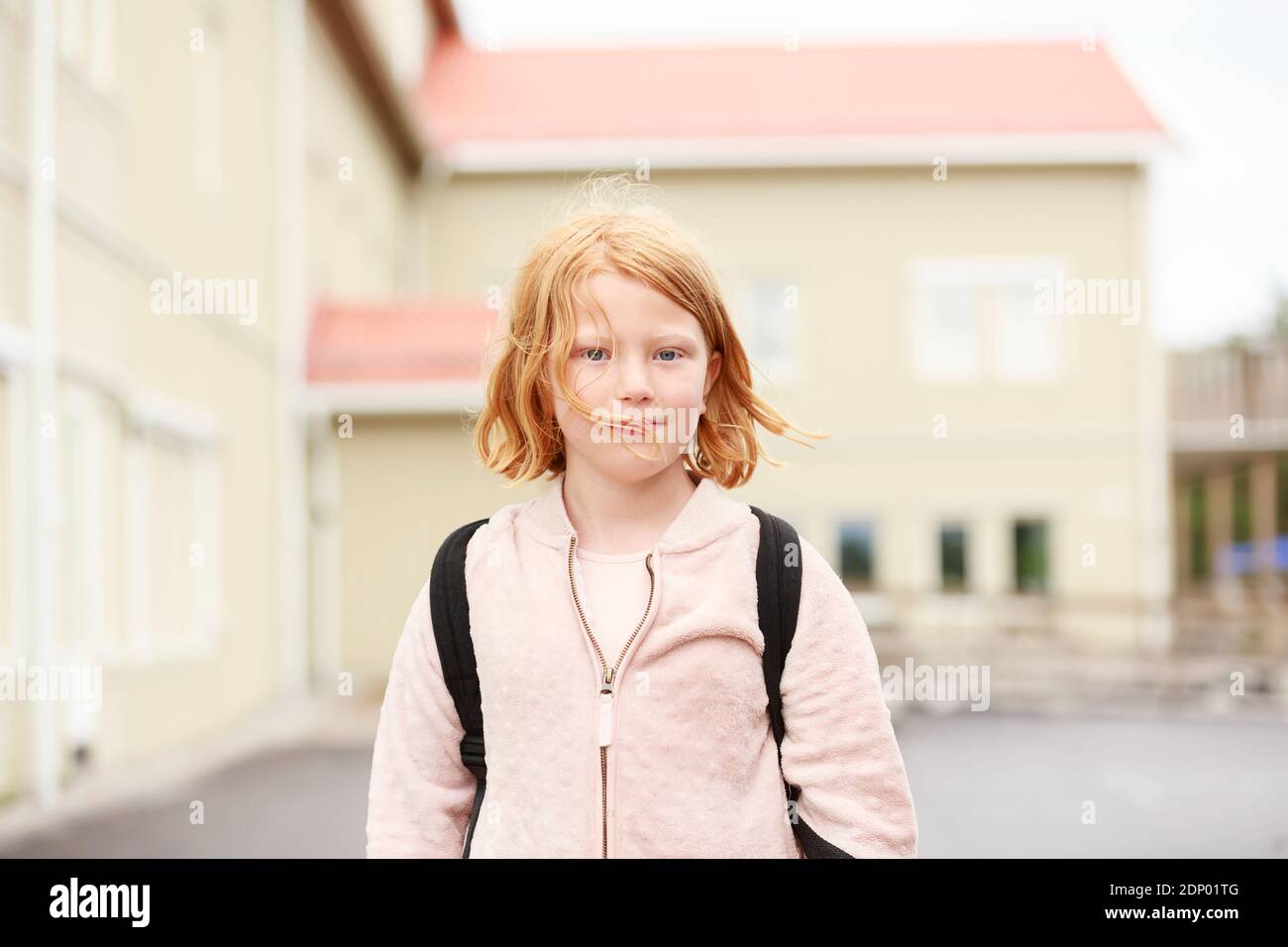Girl looking at camera Stock Photo - Alamy