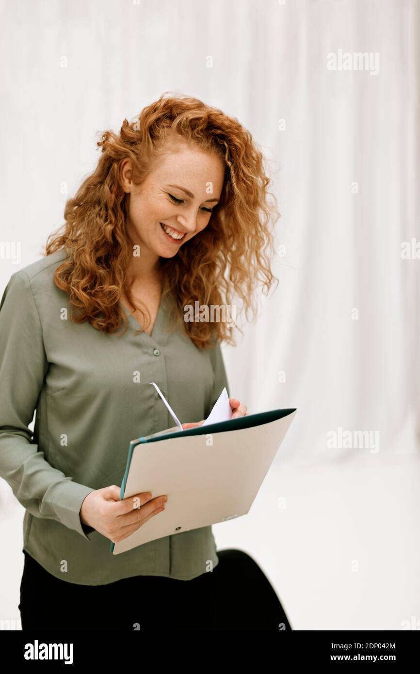 Business people checking work hi-res stock photography and images - Alamy