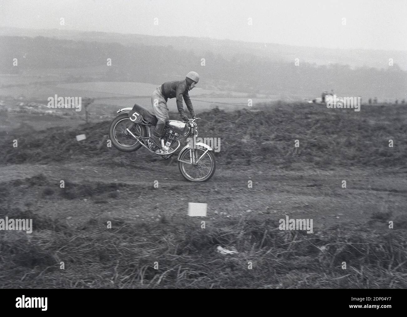 1950s, historical, motor cyclist riding a motorbike on a motorcycle ...