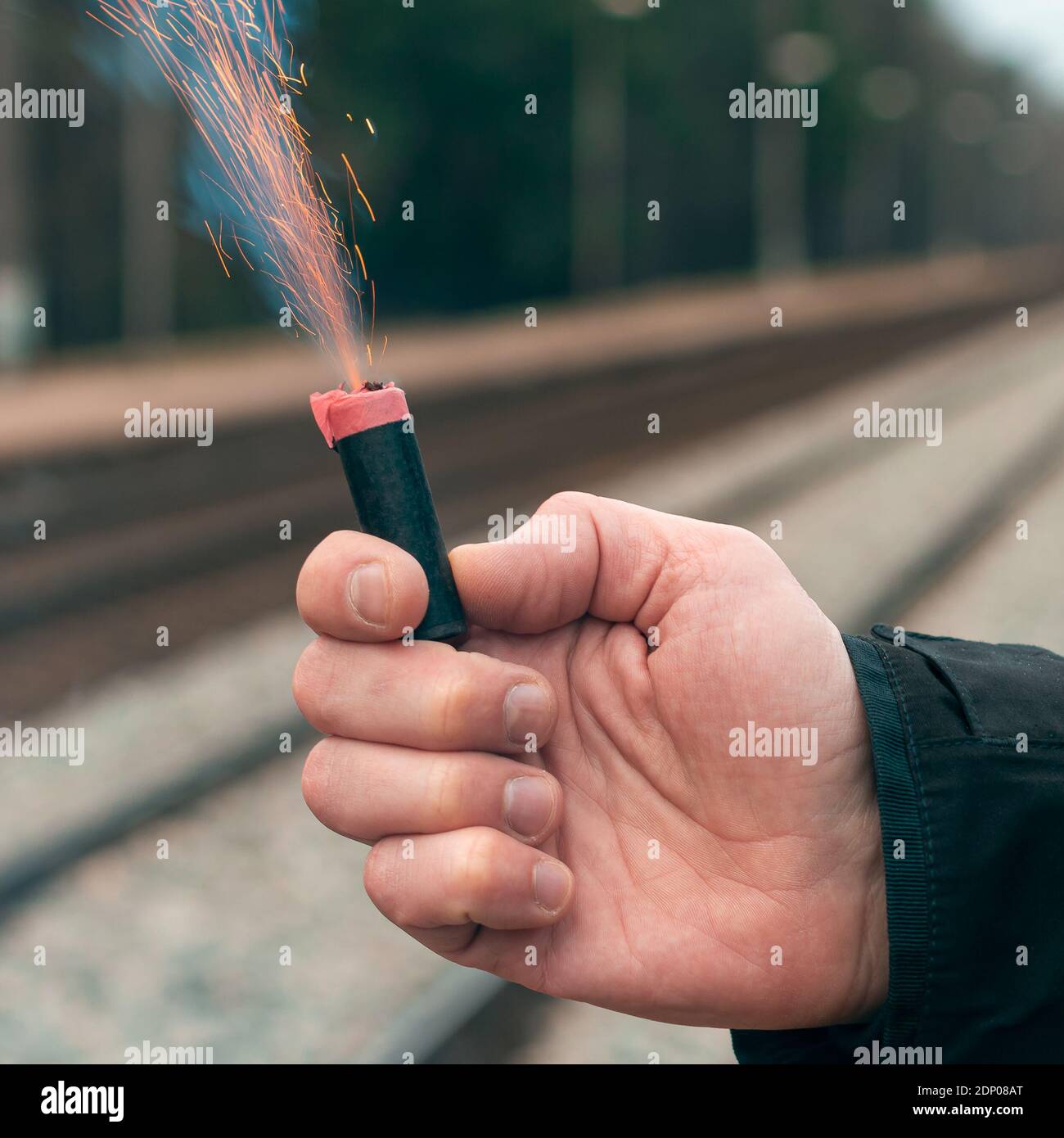 The Firecracker in a Hand. Man Holding a Burning Petard in His Hand. A ...