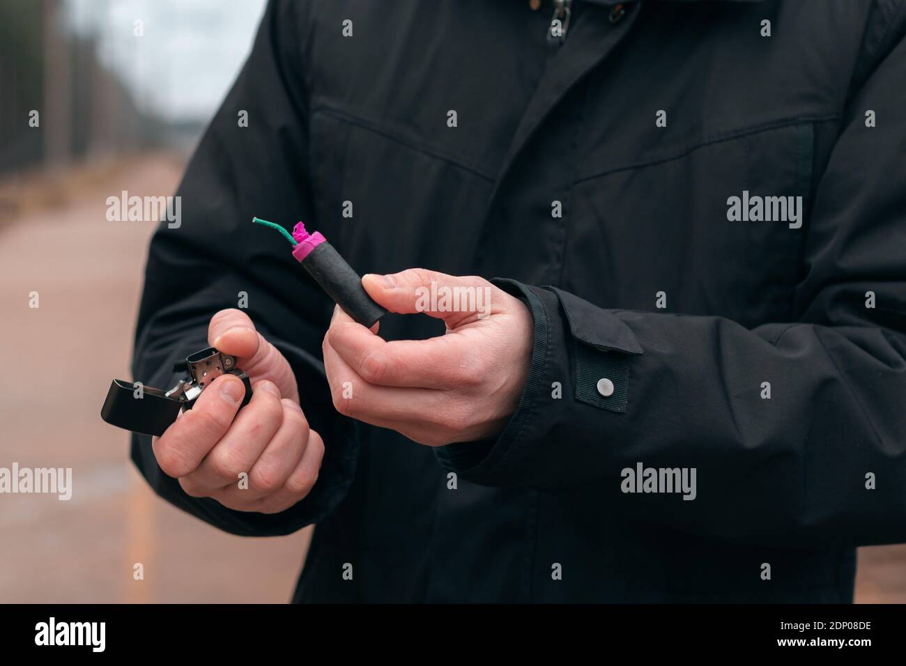 Man lighting a firework hi-res stock photography and images - Alamy