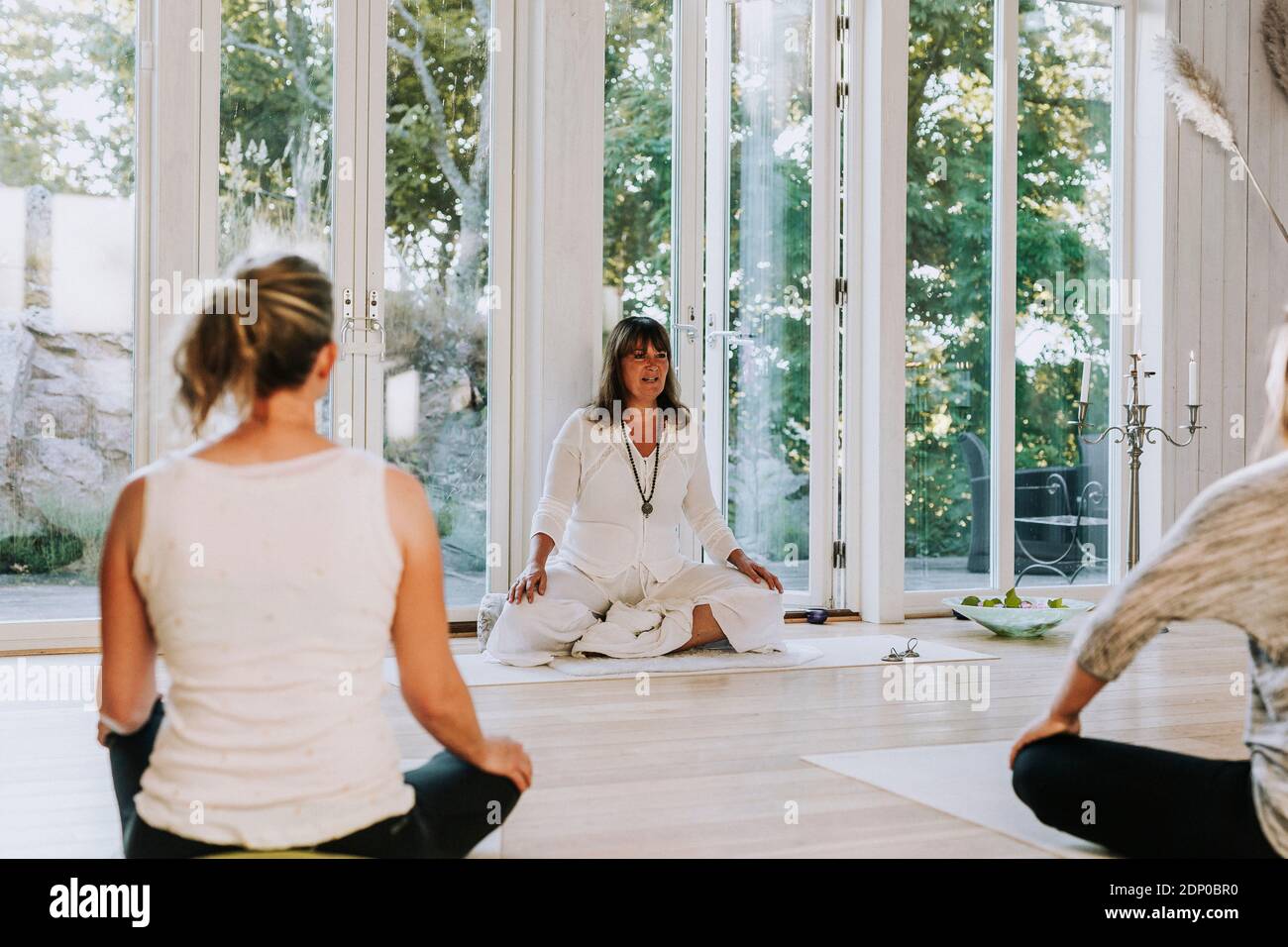 People practicing yoga Stock Photo - Alamy