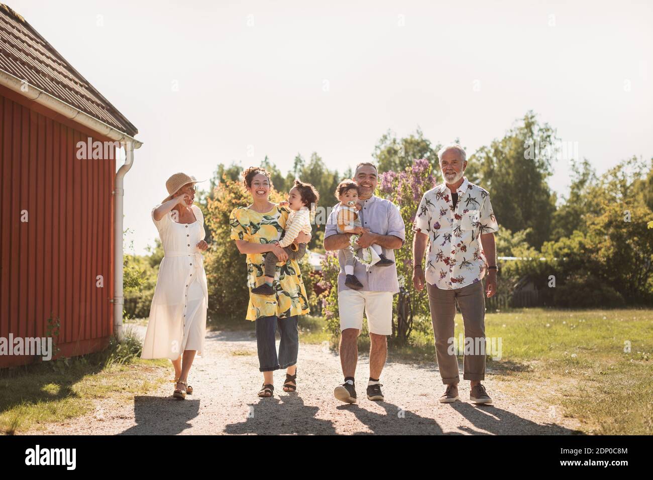 Three generation family walking together Stock Photo - Alamy