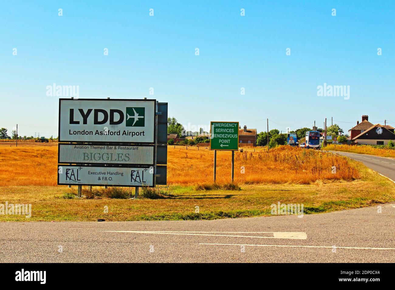 Road signs by B2075 Romney Rd near Lydd village. Lydd Airport is 1 NM ...
