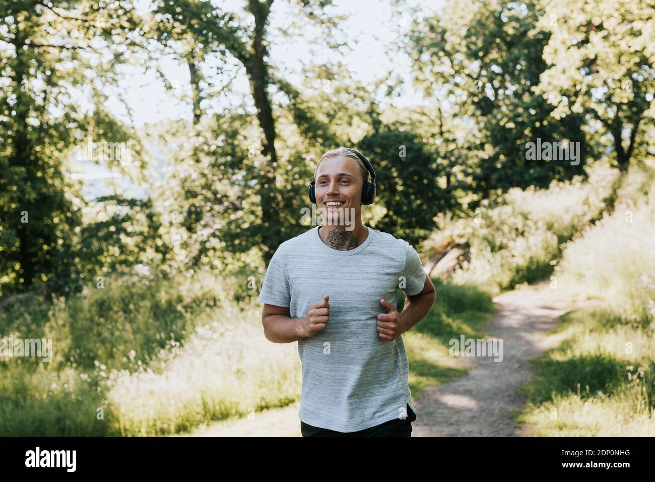 Fit man jogging on path hi-res stock photography and images - Alamy