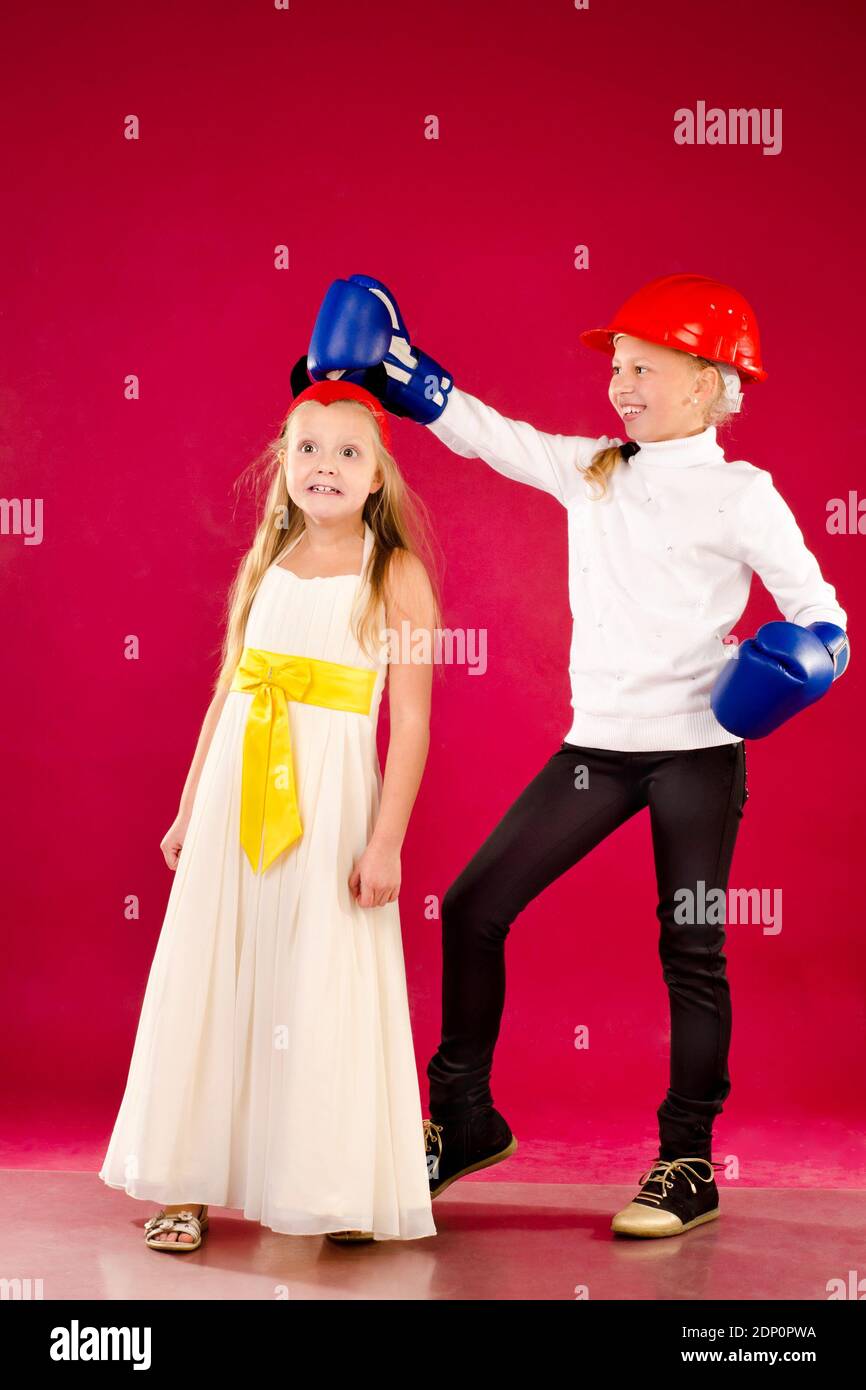 two little girls playing in studio Stock Photo - Alamy