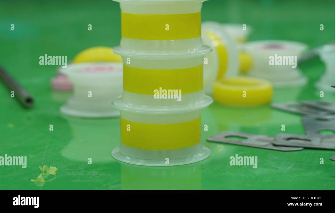 Preparing a replace new of a plastic roller with yellow rubber for ...