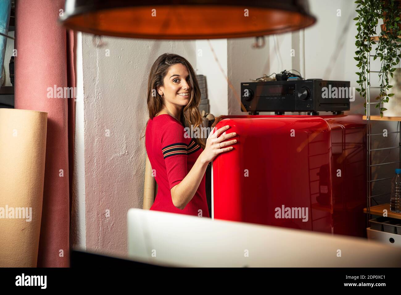 Woman opening fridge door hi-res stock photography and images - Alamy