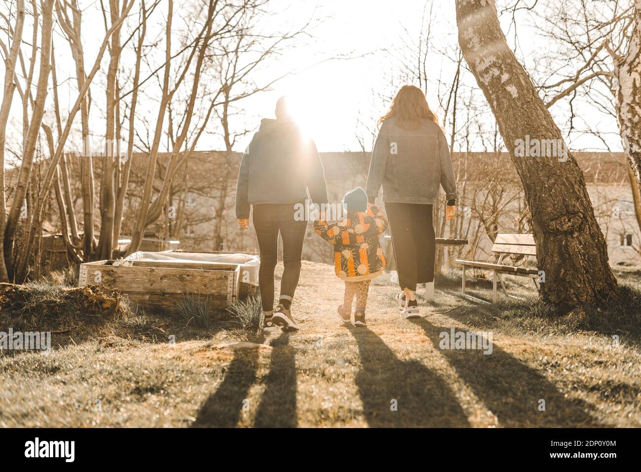 Women with daughter having walk Stock Photo - Alamy