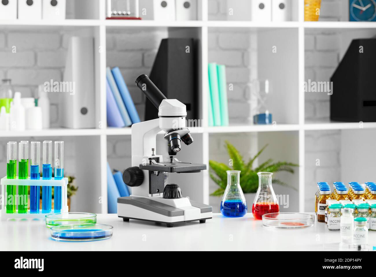 Scientific healthcare research background with microscope in medical ...