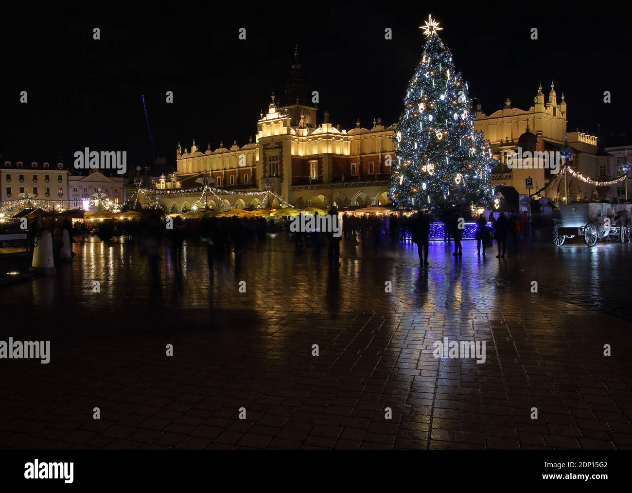 Main market square in Krakow, Poland, at night decorated with big ...