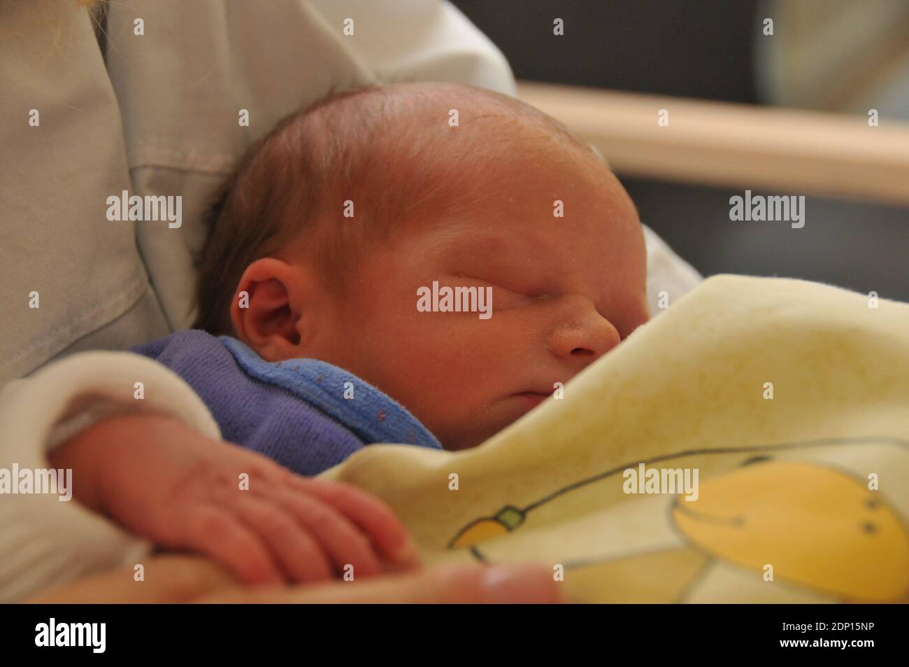 sleeping little baby with mummy Stock Photo - Alamy