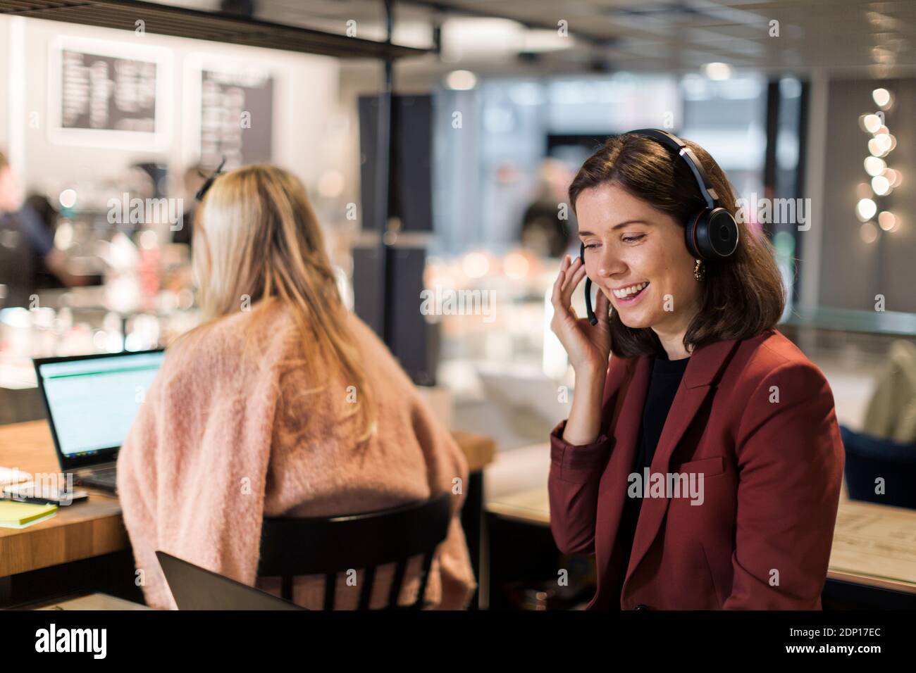 Woman wearing headset work hi-res stock photography and images - Alamy