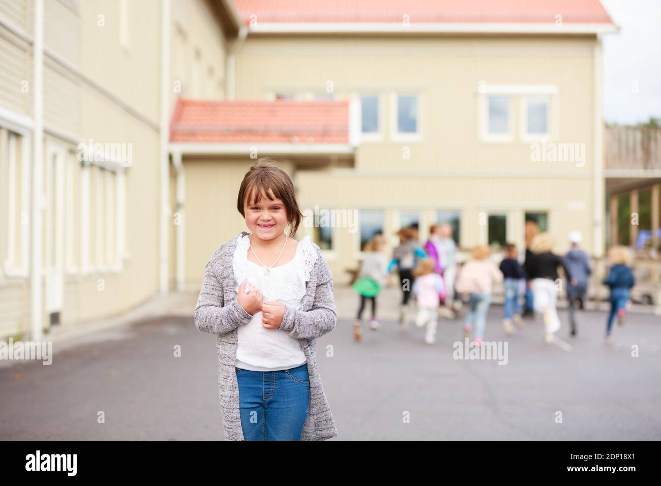 Girl in front school hi-res stock photography and images - Alamy