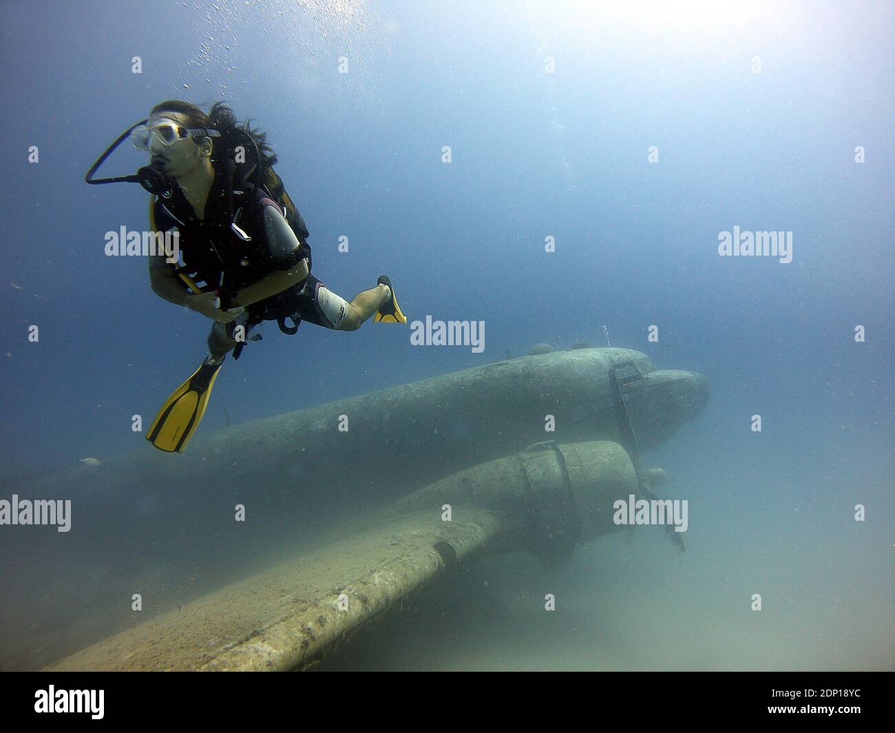 A diver hovering over a plane wreck. Antalya Turkey Stock Photo - Alamy
