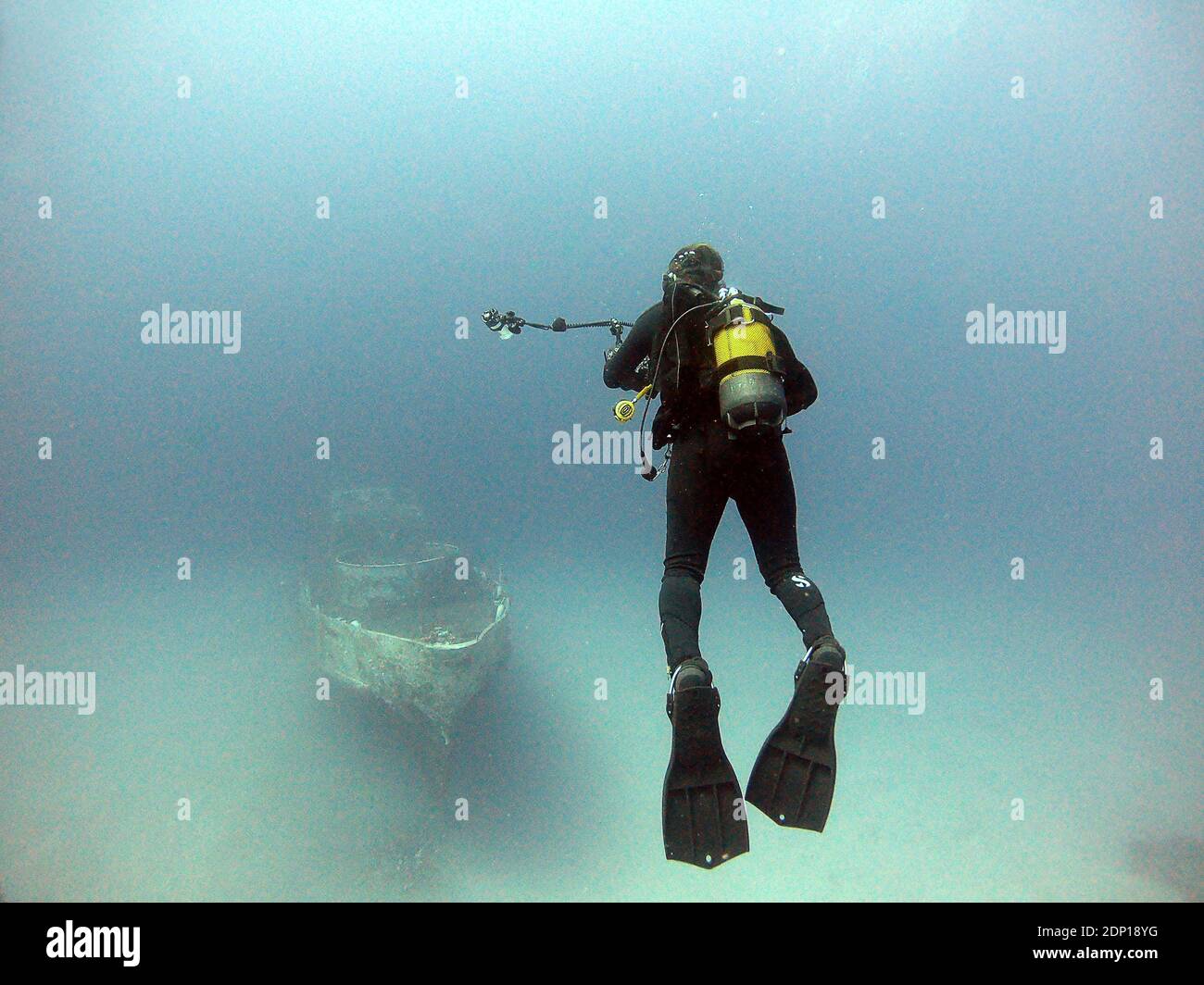 The diver moves towards the wreck to take pictures. Antalya Turkey ...