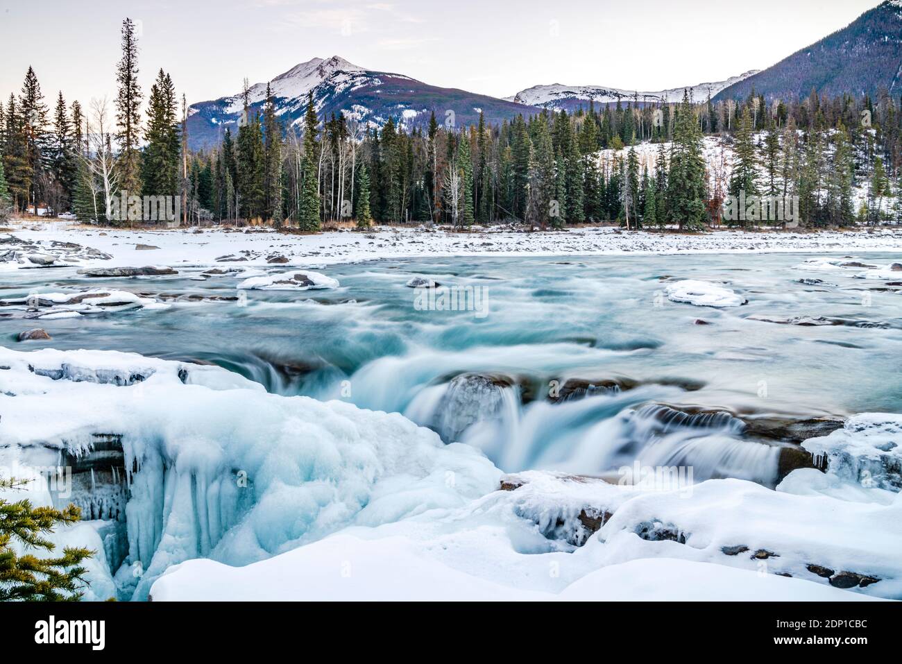 Half Frozen Athabasca Falls During Sunrise In Winter Stock Photo - Alamy