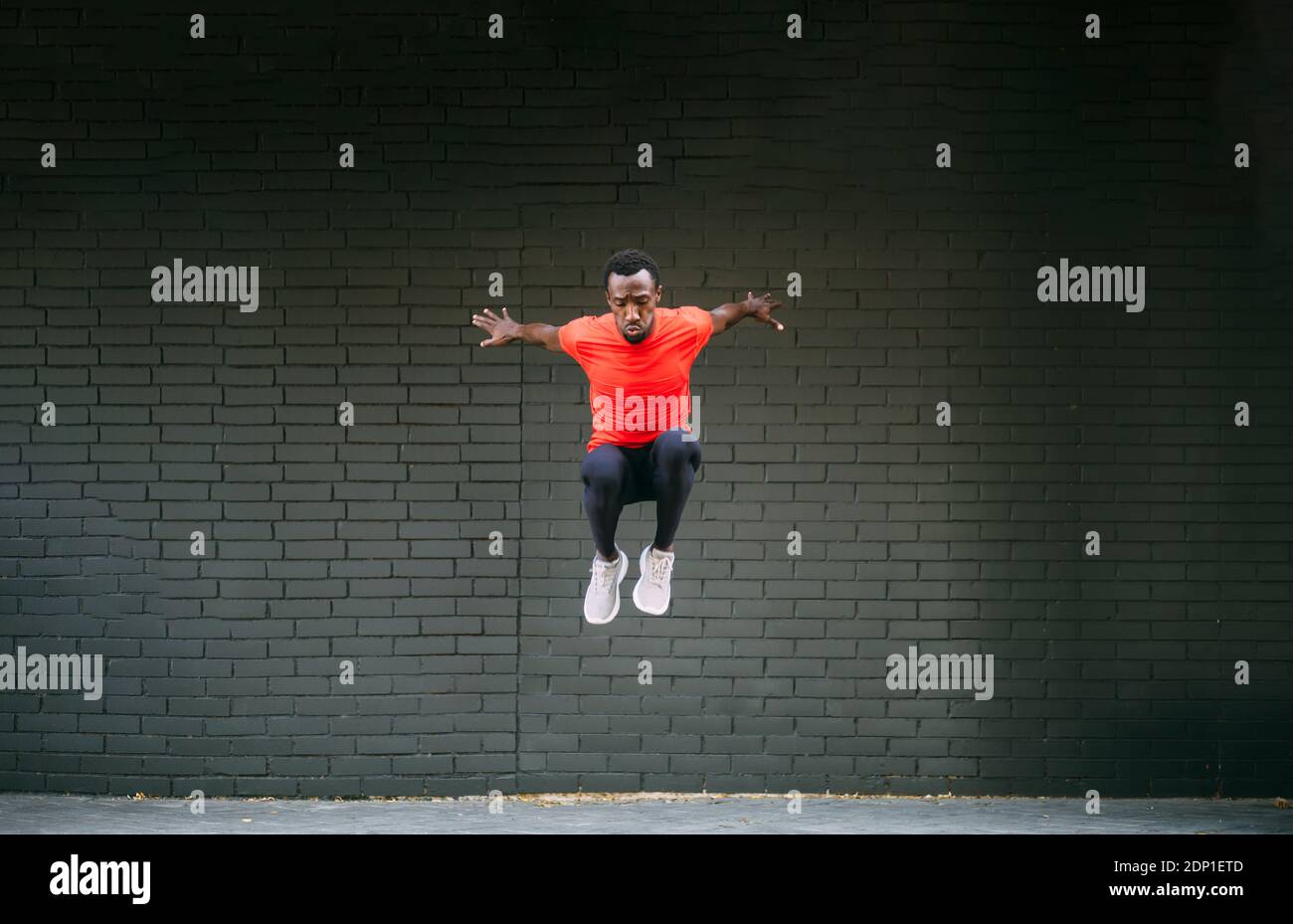 Brick wall with runner in front hi-res stock photography and images - Alamy
