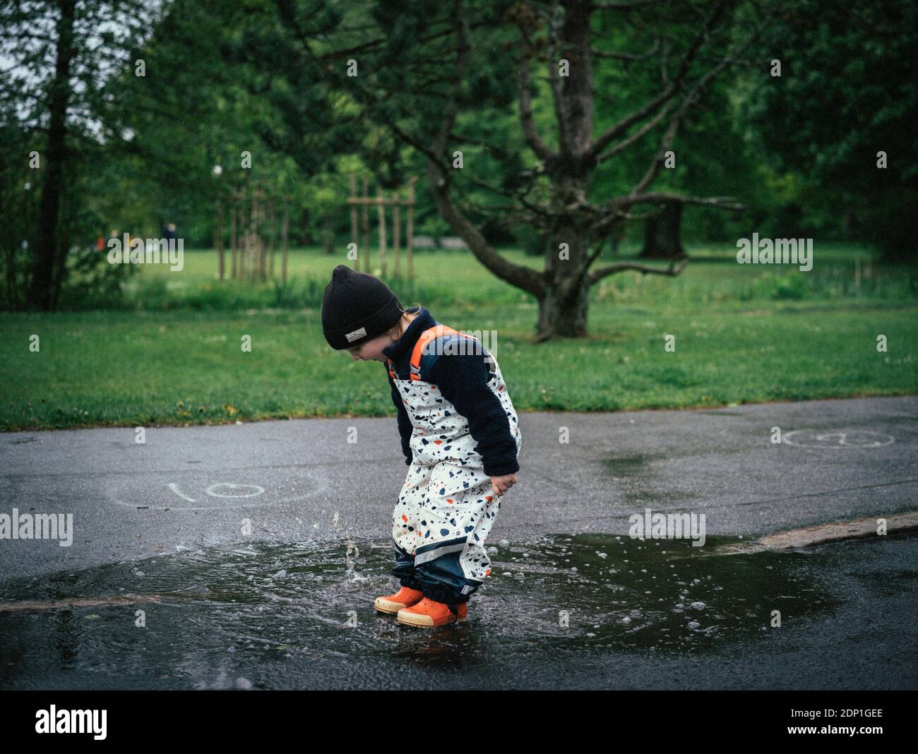 Children rain puddle hi-res stock photography and images - Alamy