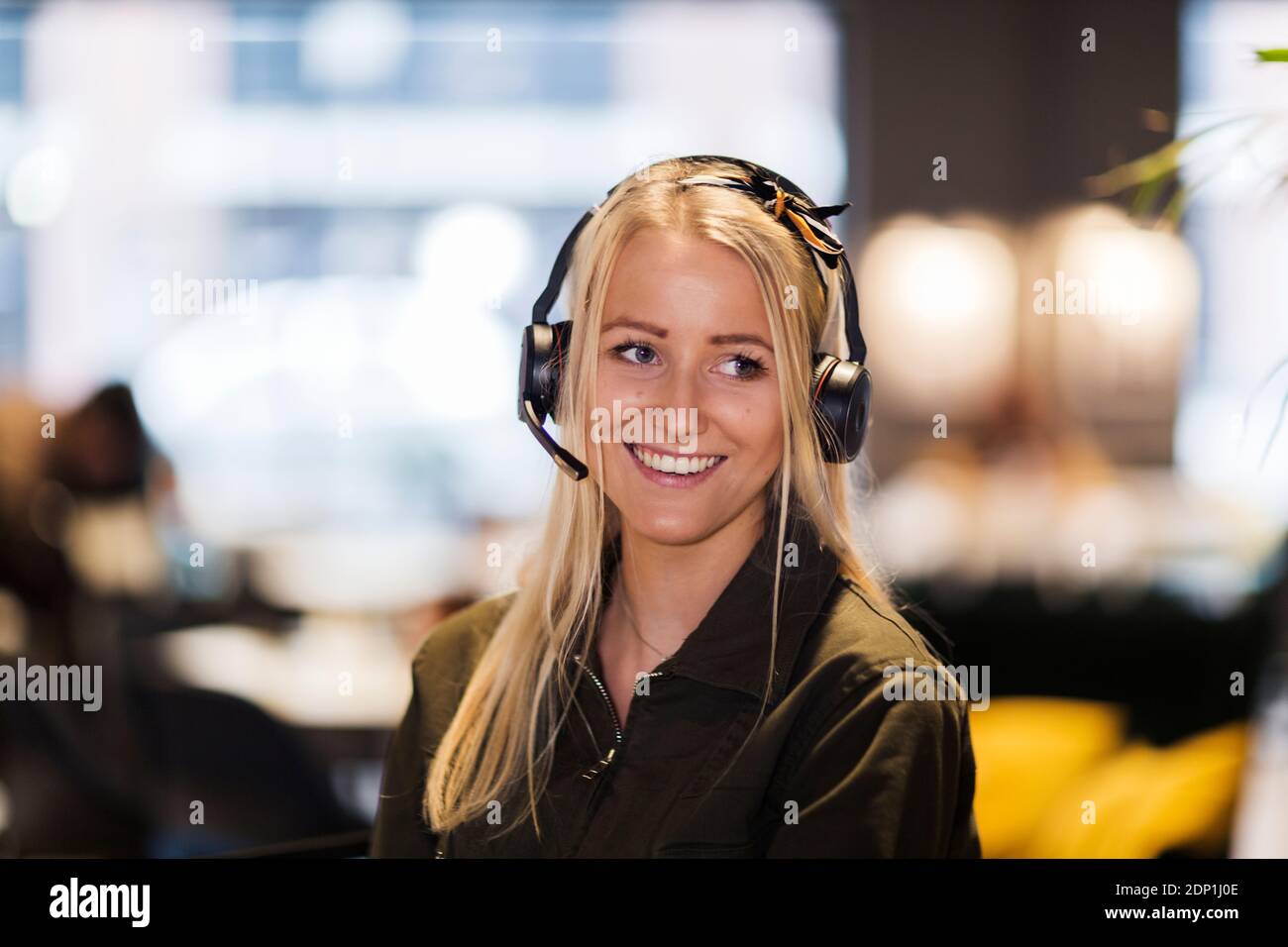 Woman wearing headset work hi-res stock photography and images - Alamy