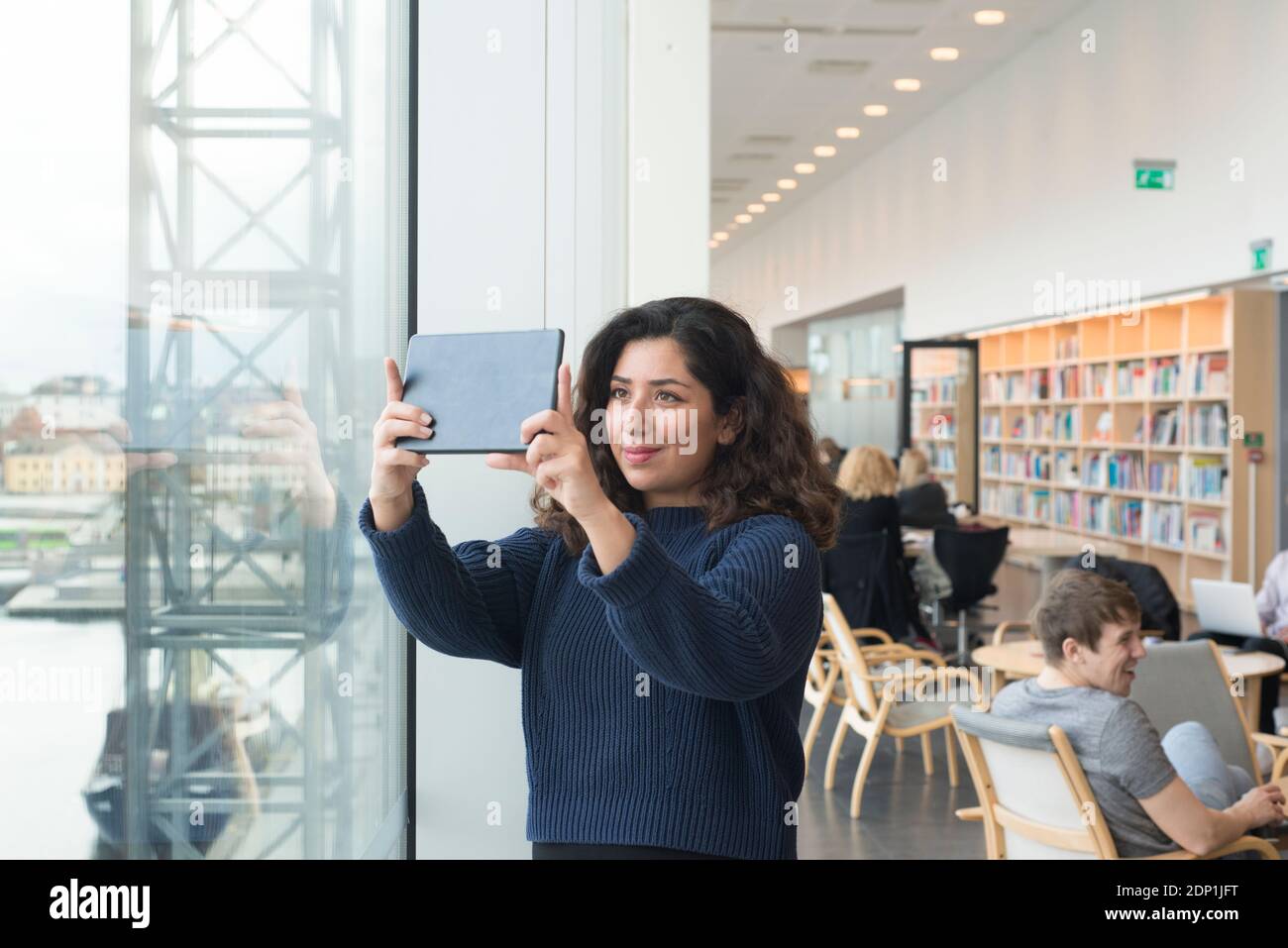 Library student woman taking hi-res stock photography and images - Alamy