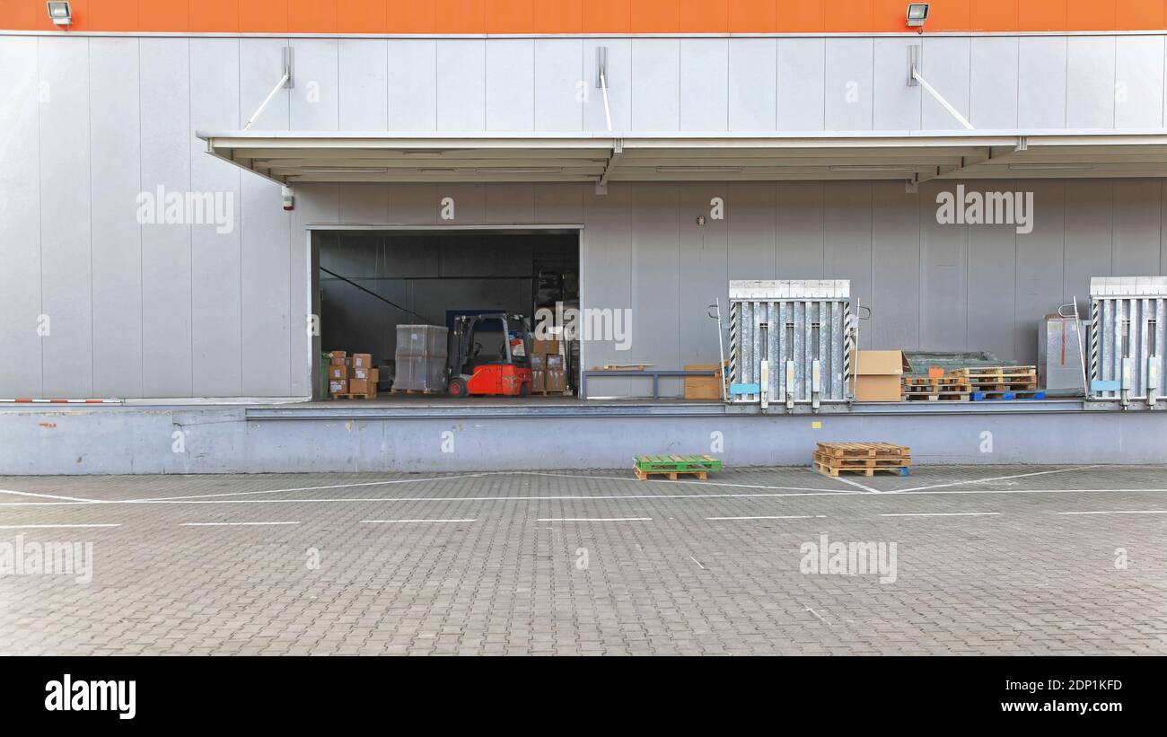 Loading Ramp Dock at Big Distribution Warehouse Stock Photo - Alamy