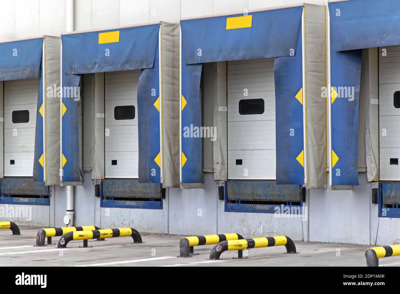 Loading Ramp Cargo Doors at Distribution Center Warehouse Stock Photo ...