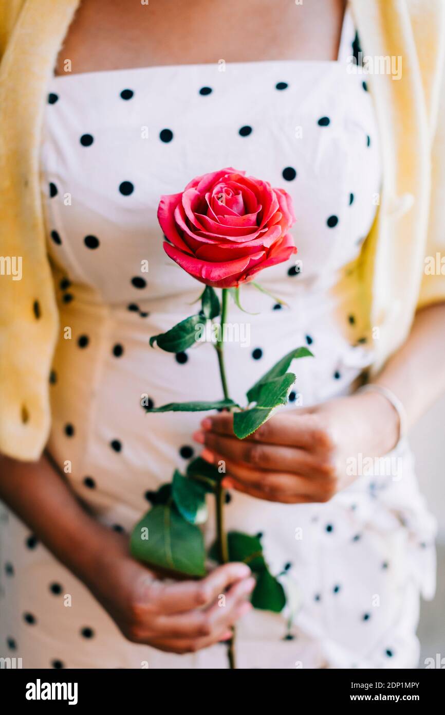 Woman holding polka dot hi-res stock photography and images - Alamy