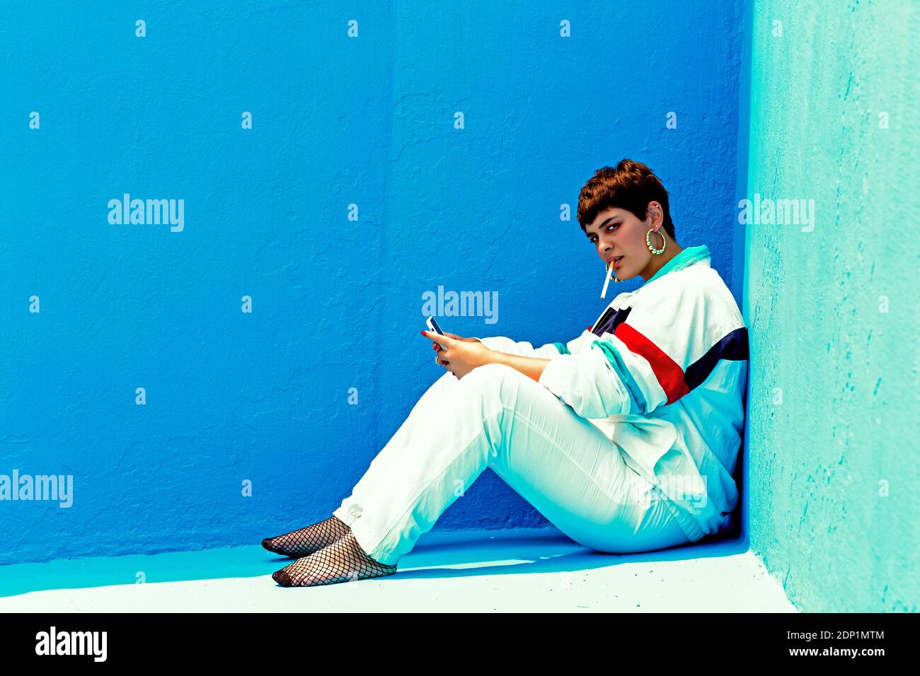 Woman smoking attitude hi-res stock photography and images - Alamy