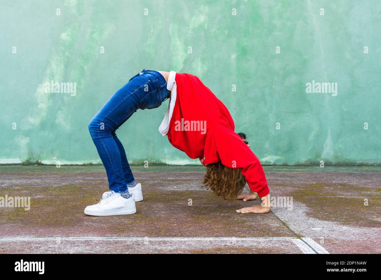 Young man in bridge position Stock Photo - Alamy
