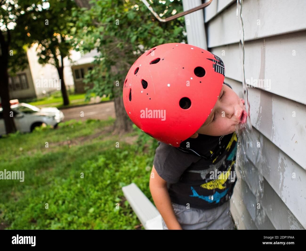 Boy falling back into water hi-res stock photography and images - Alamy