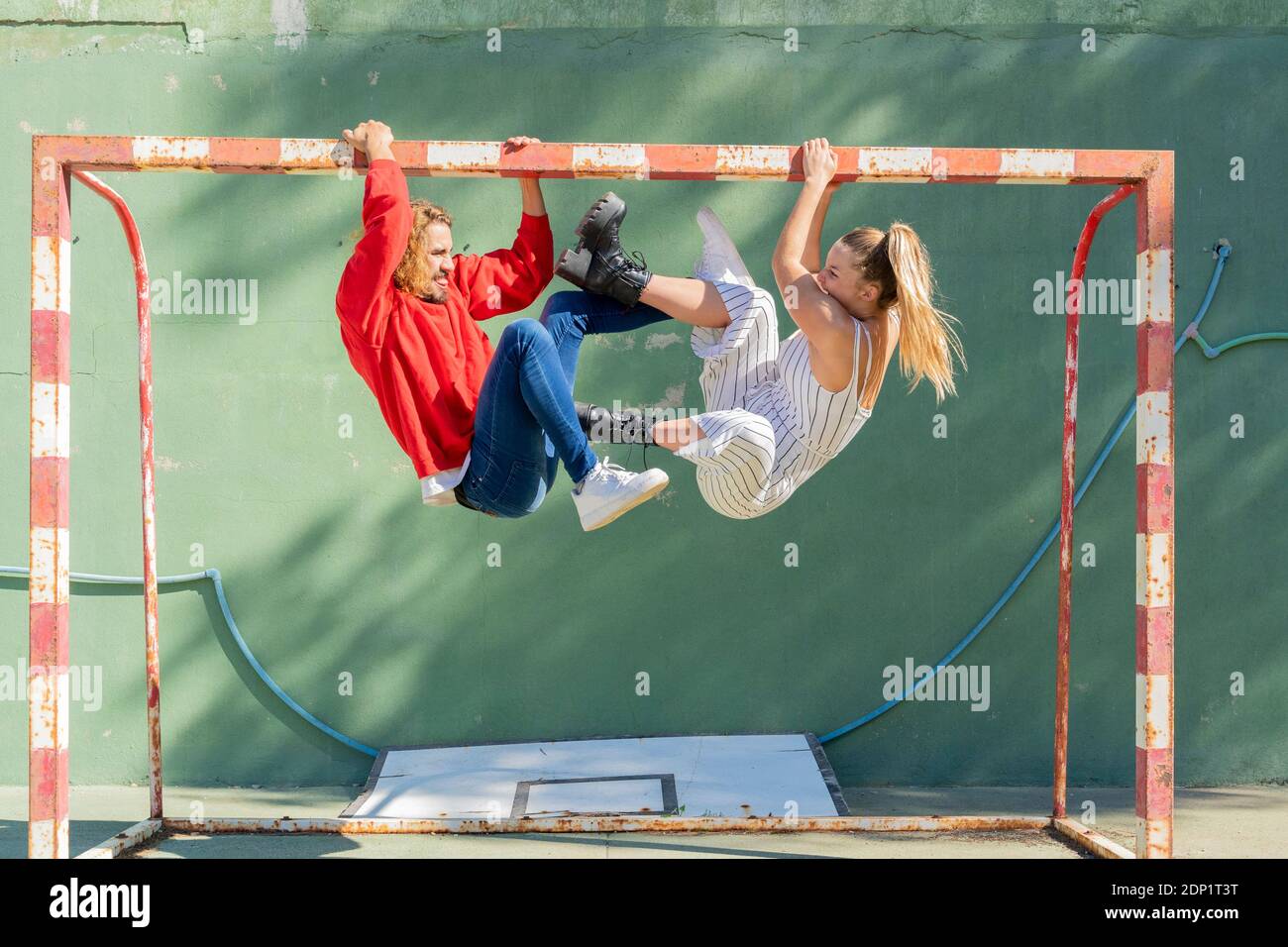 Young couple playfighting Stock Photo - Alamy