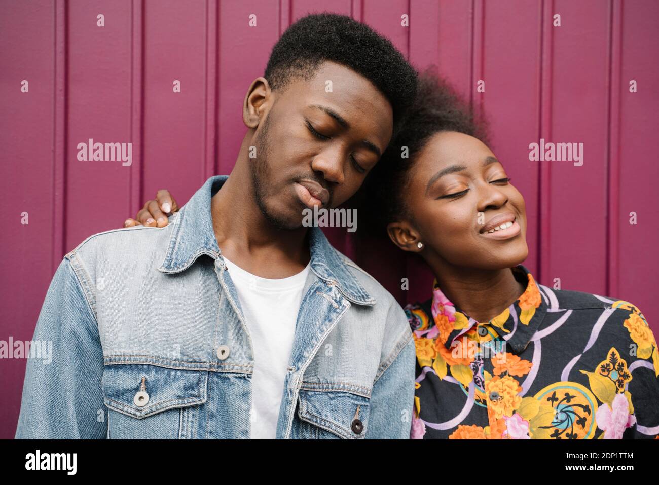Portrait of happy young couple head to head with eyes closed Stock ...