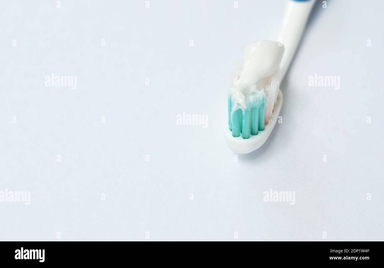 toothpaste on toothbrush arranging on white background Stock Photo - Alamy